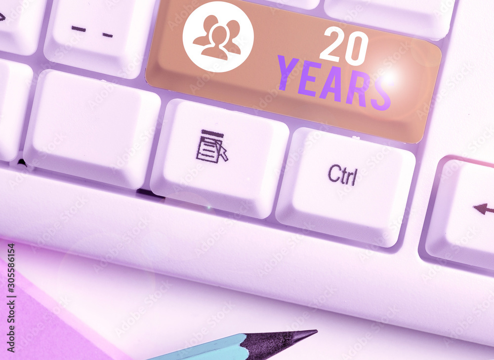 Writing note showing 20 Years. Business concept for Remembering or ...