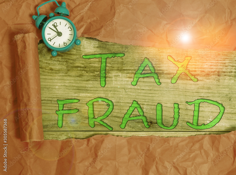 Writing note showing Tax Fraud. Business concept for entails cheating ...