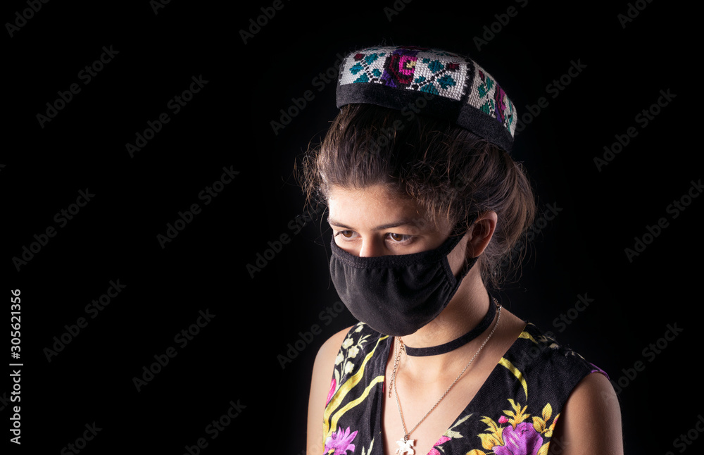 Beautiful girl, a teenager in a national historical national costume ...