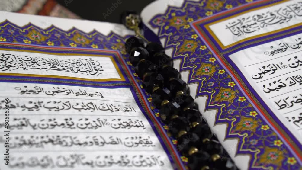 Video „Track shot of Muslims Holy Book Quran Al Kareem Quran Majid ...