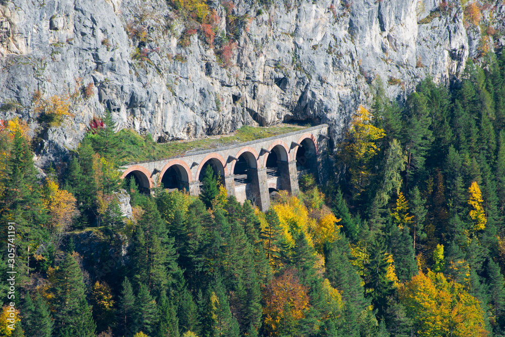 Viaduct and tunnel on the Semmering Railway. The Semmering Railway is ...