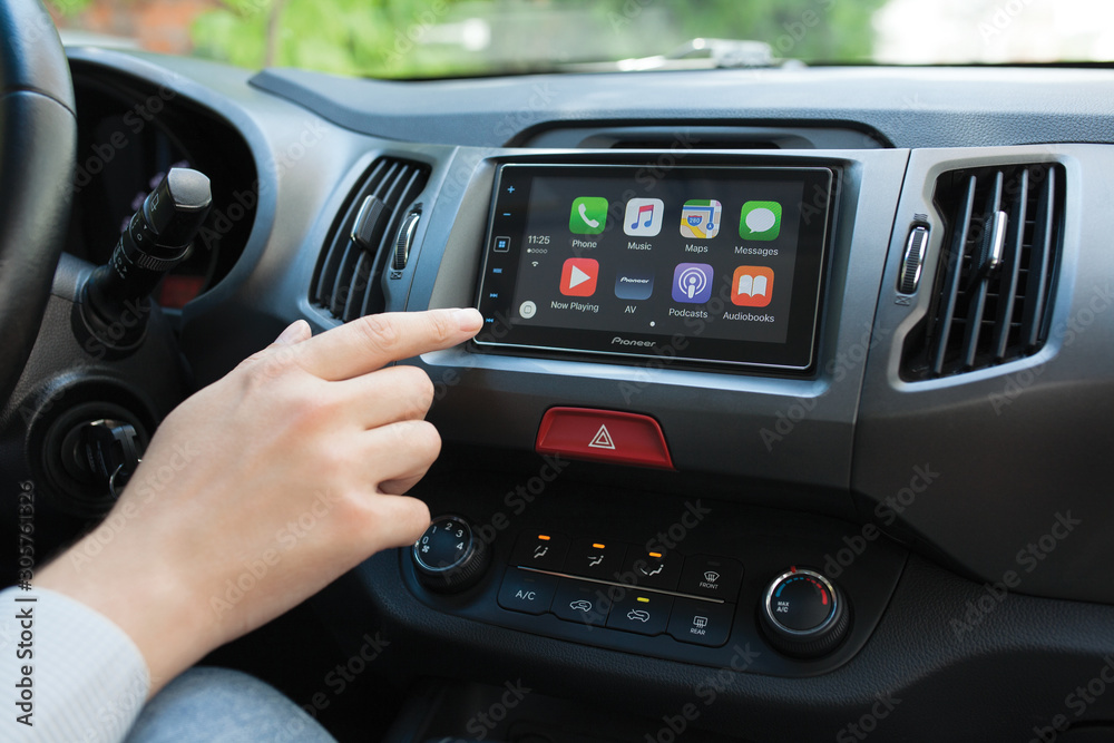 Man touching to home screen multimedia system with Car Play Stock Photo ...