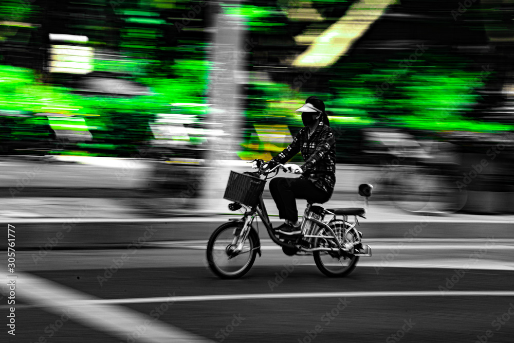 Bike with slow shutter blur background Stock Photo | Adobe Stock