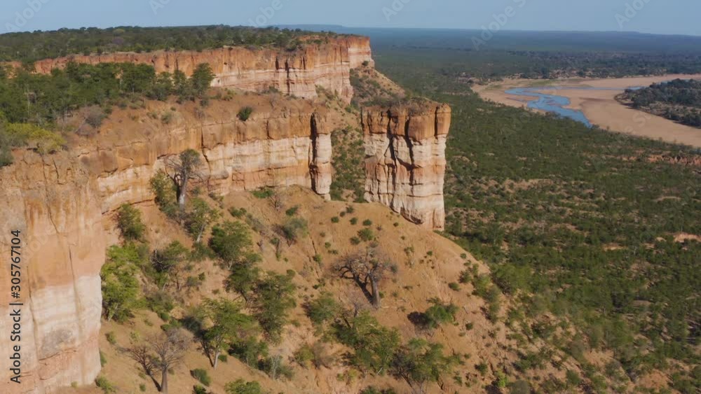 Spectacular aerial view flying over the beautiful red sandstone Chilojo ...