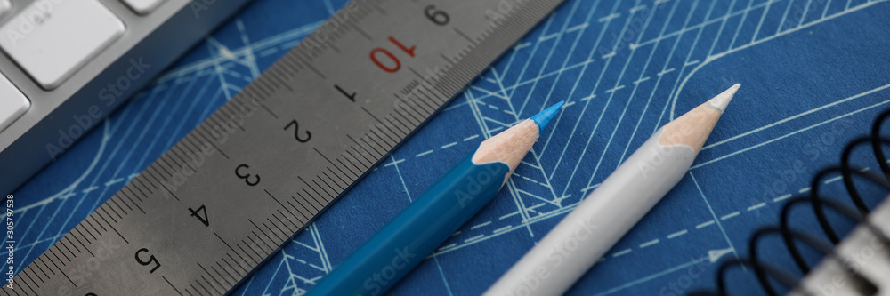 Drawing tools and computer keyboard lying over blueprint paper Stock ...