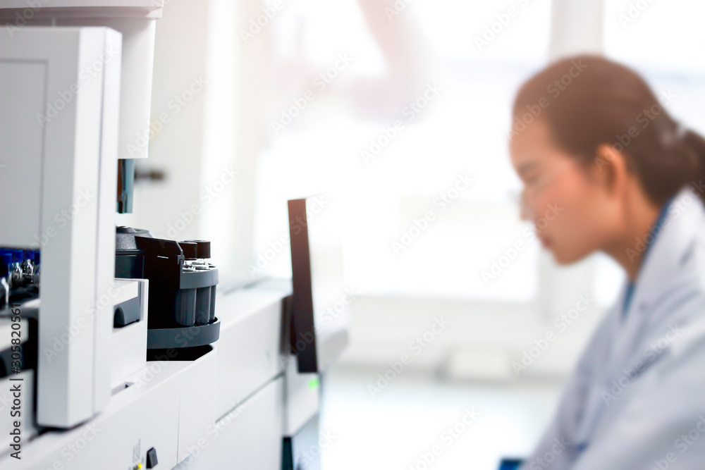 Vials (small bottle) in tray inside injection section of Gas ...