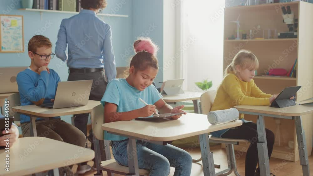 Elementary School Computer Science Class: Smart Boy Uses Laptop ...