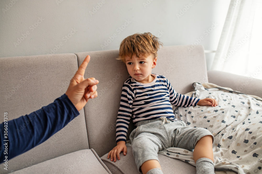 Strict father abuseshis son. Father Shouting At Young son. Angry father ...