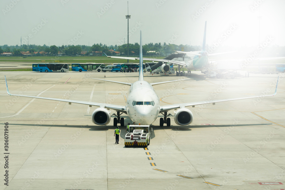 Airplane at terminal gate ready for takeoff - Modern international ...