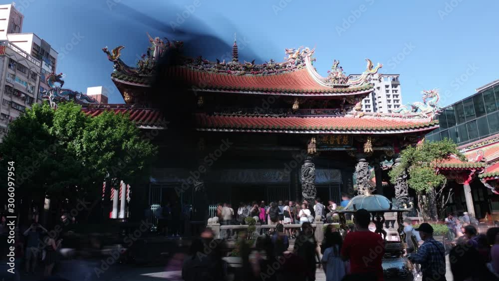 Worshipers at Longshan Temple. The temple was originally built by ...