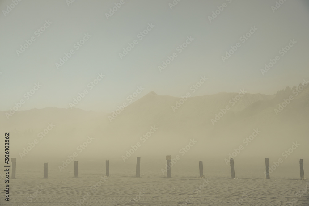 Dust and Sandstorm in desert, Light shines through the rising grains of ...