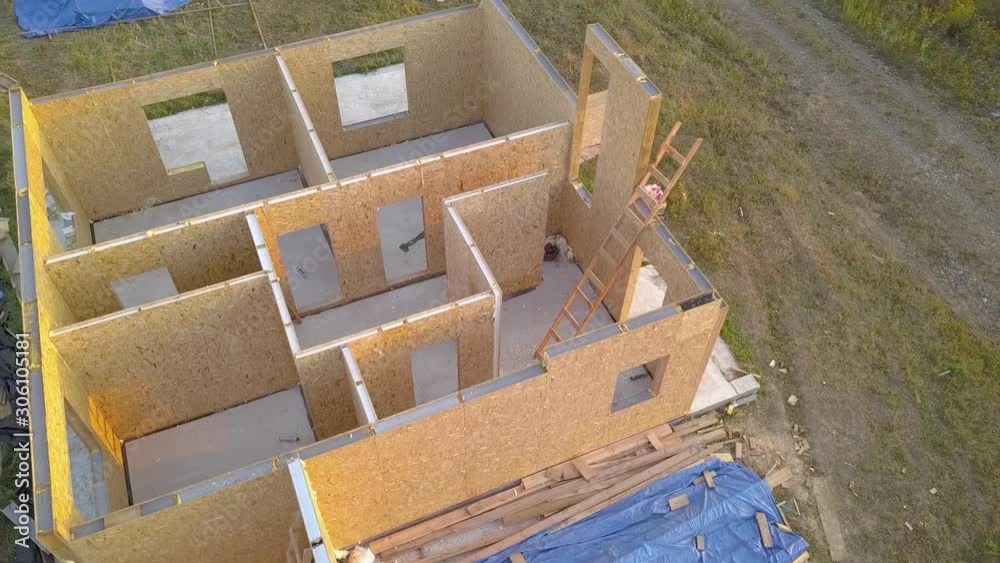 Construction of new and modern modular house. Walls made from composite ...