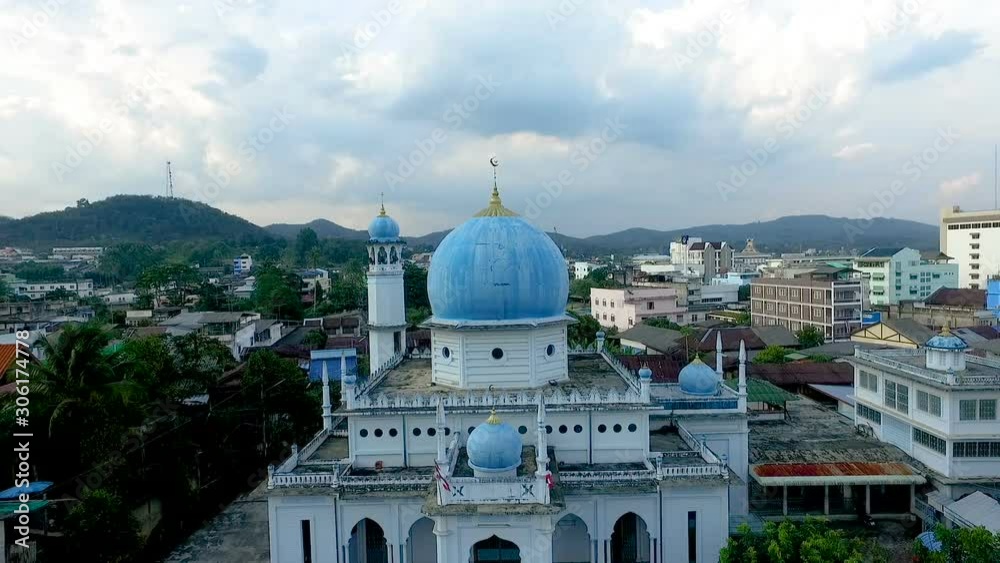 Wide shot aerial drone footage.Flying.The mosque of Betong, Yala is in ...