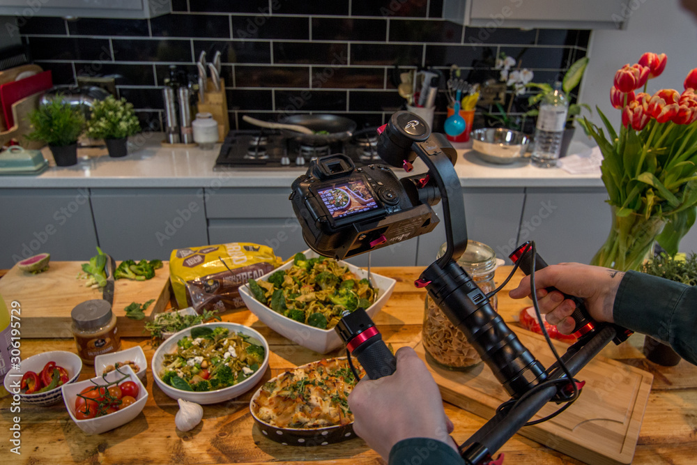 Professional video quality movie homemade food on an oak table full of ...