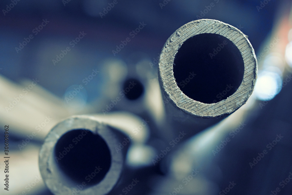 metal pipes of circular cross section, macro, blurred background Stock ...