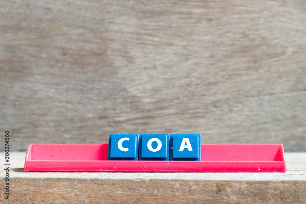 Tile letter on red rack in word COA (abbreviation of certificate of ...