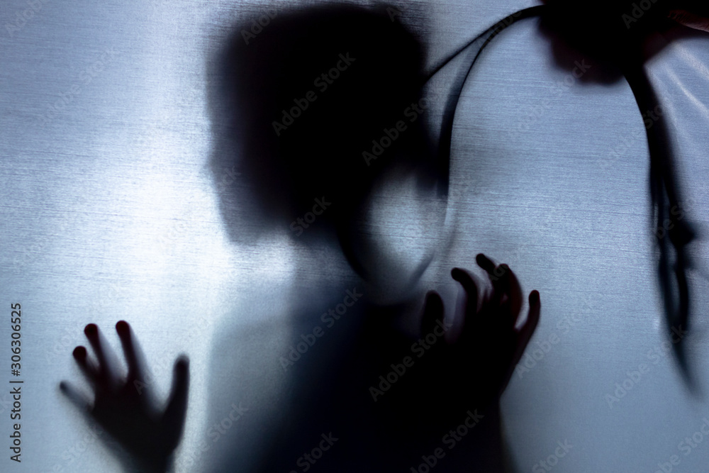 no focus. the fabric behind her. silhouette and shadow. child over head ...