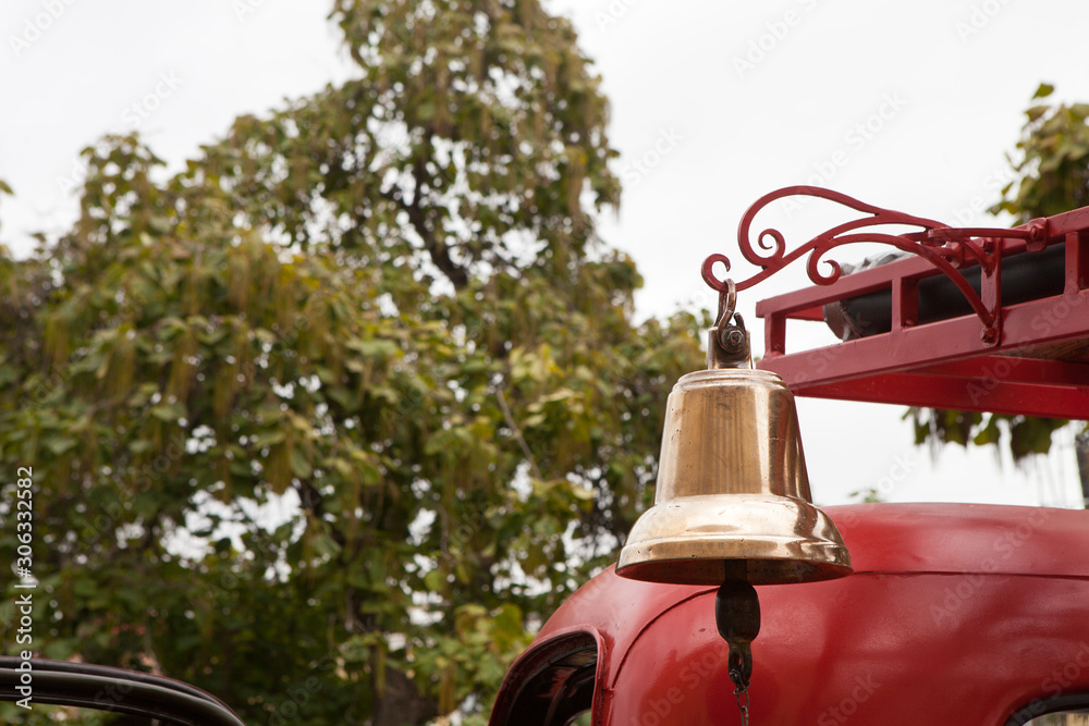 old skool fire bell on a red fire truck. Stock Photo | Adobe Stock