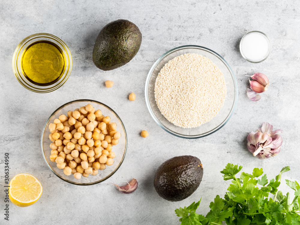 Fresh ingredients for healthy food hummus , cheak peas, avocado, olive ...