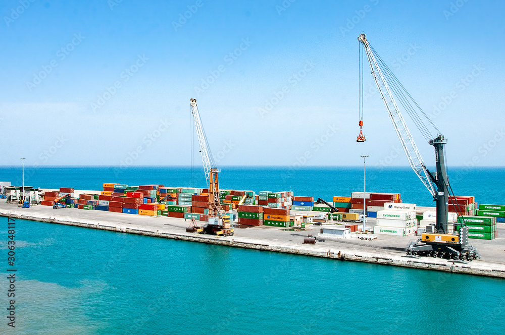 Bari, Italy, 24.4.2019: Big cargo port with cranes moving containers ...