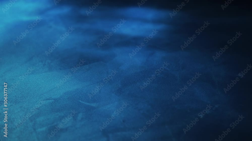 Organic and beautiful textured blue background. Slow rotation with ...