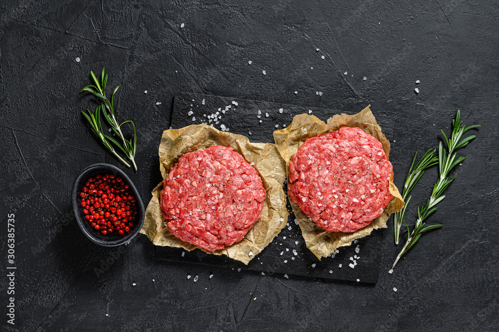 Ground raw meat patties. Meat patties ready to cook. Barbecue party ...