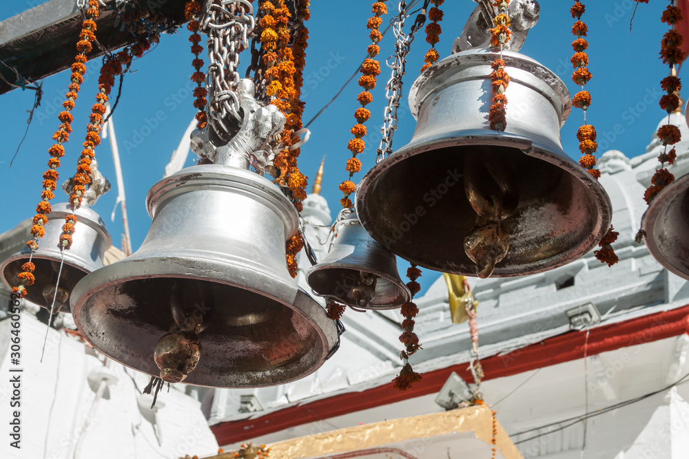 Large temple bells at the temple of Goddess Ganga in Gangotri, India ...
