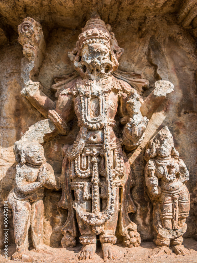 A carving of the Hindu god Narasimha at the 13th Century temple of ...