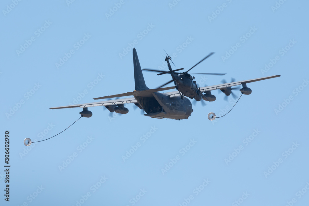 C-130J air refueling a Black Hawk helicopter Stock Photo | Adobe Stock