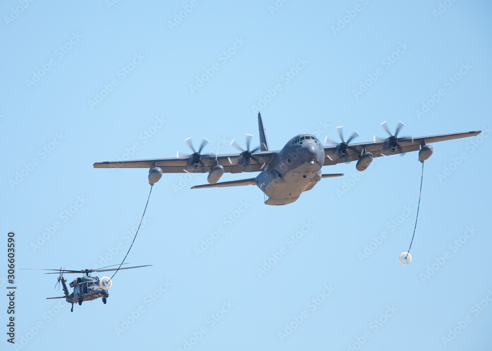 C-130J air refueling a Black Hawk helicopter Stock Photo | Adobe Stock
