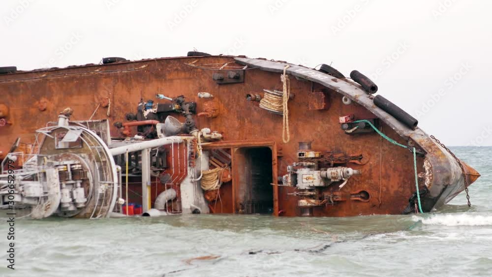 Ecological disaster. The tanker ship crashed and ran aground. Oil ...