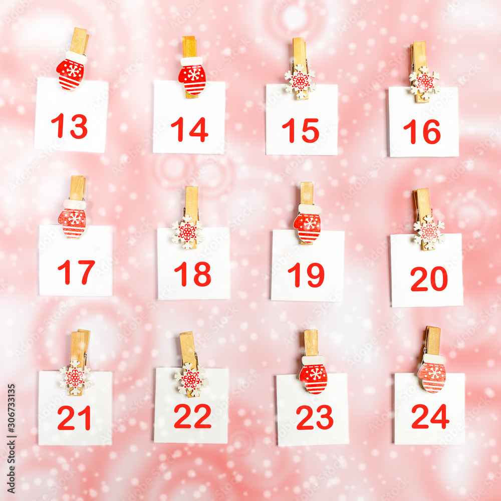 13-24 part of Advent calendar with numbers on white sheets on ...