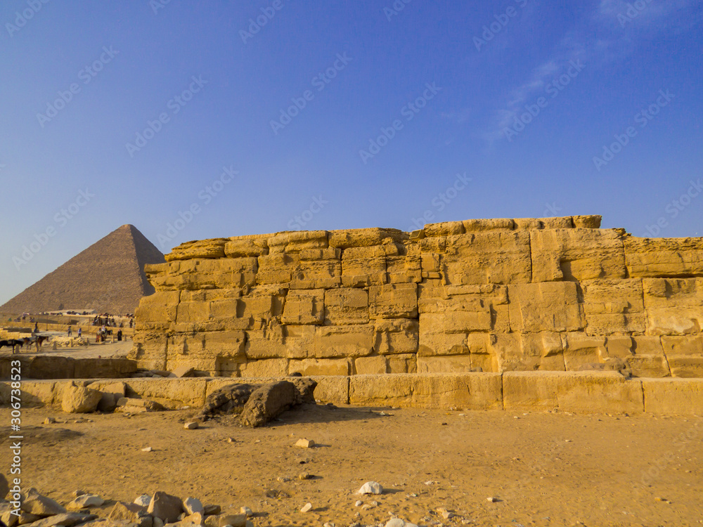 View of the Valley Temple of Khafre with the Great Pyramid of Giza in ...