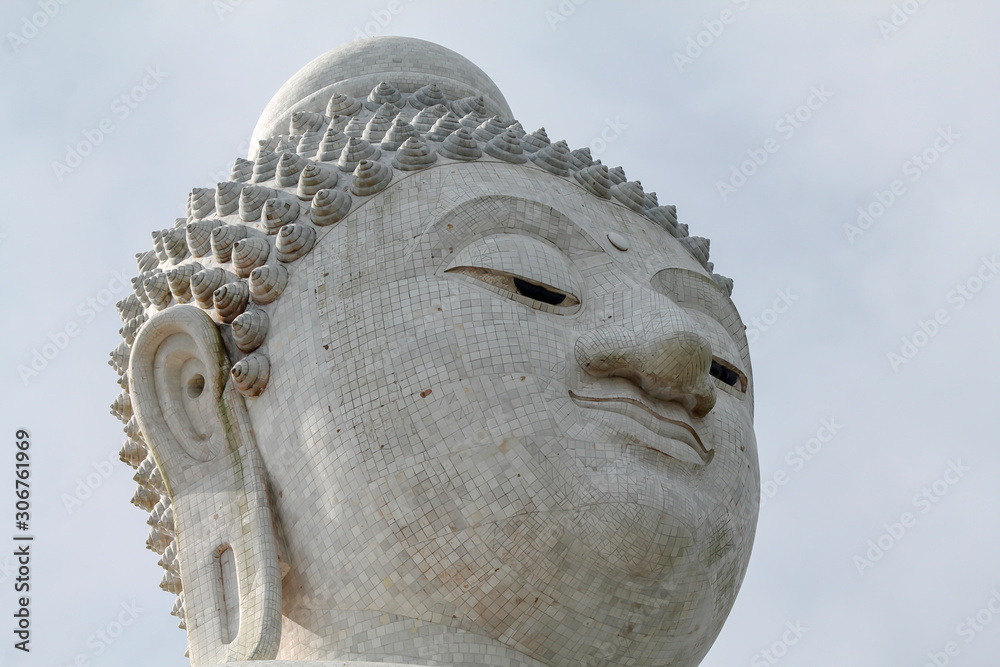 Close-up marble statue of a snow-white Big Buddha on the island of ...