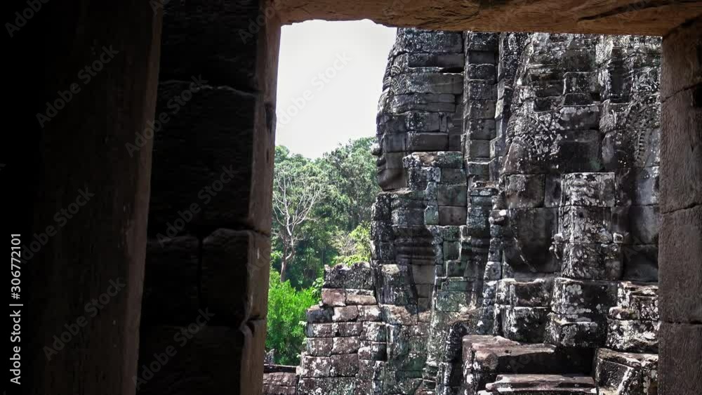 4K, Face towers depicting Bodhisattva Avalokiteshvara. Smiling faces ...