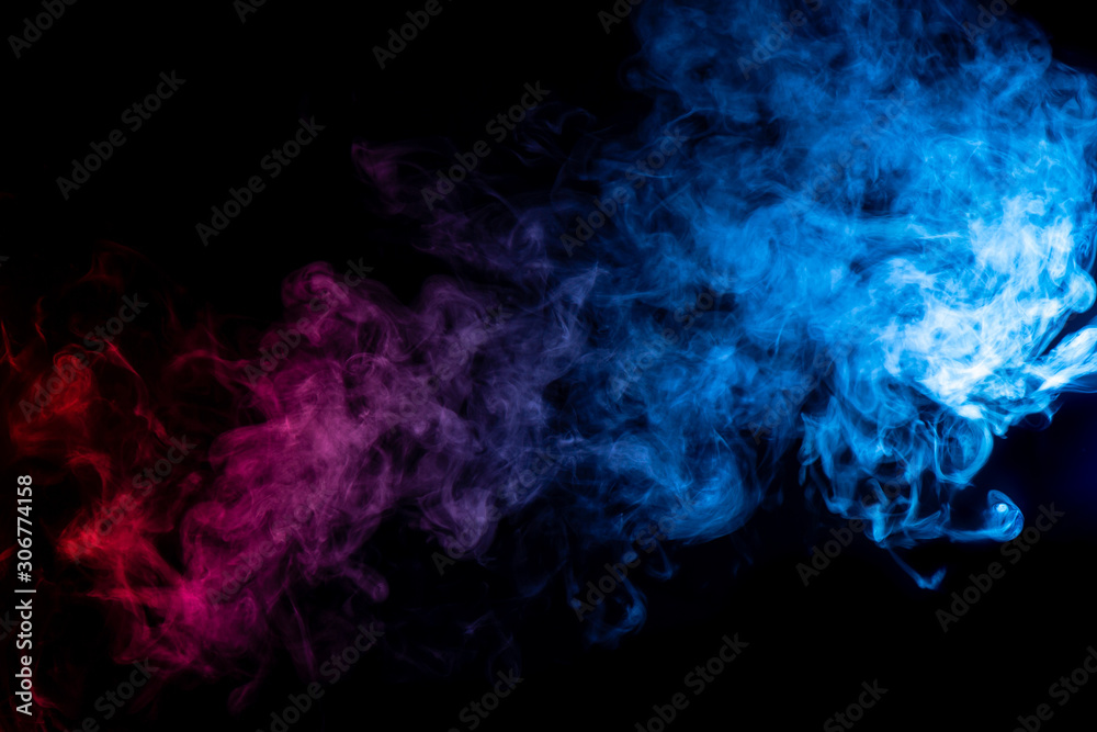 whispy deep durple and electric blue smoke on black background with ...