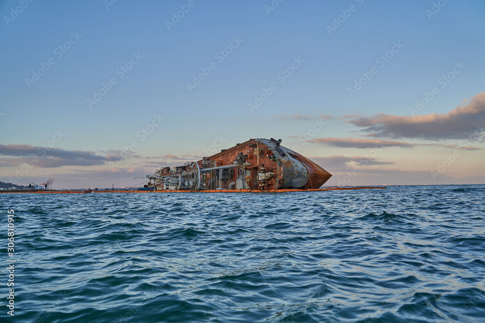 sunken tanker. Tanker Bunker threw storm ashore. The tanker lies on its ...
