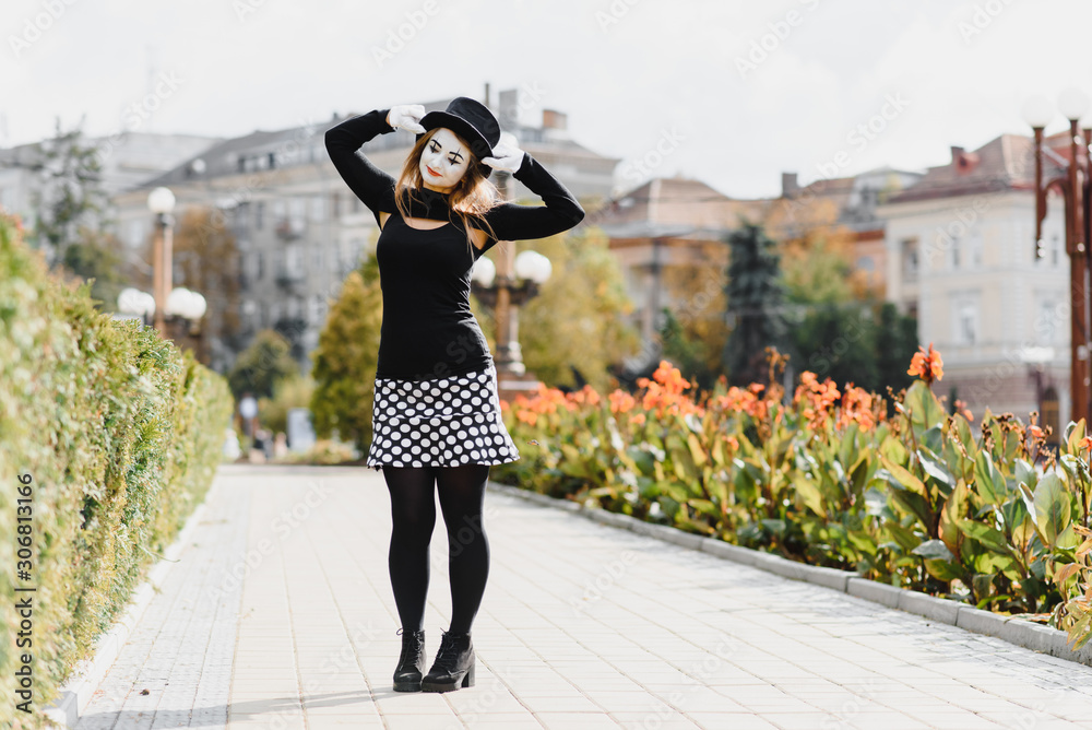 The girl with makeup of the mime. improvisation. mime shows different ...