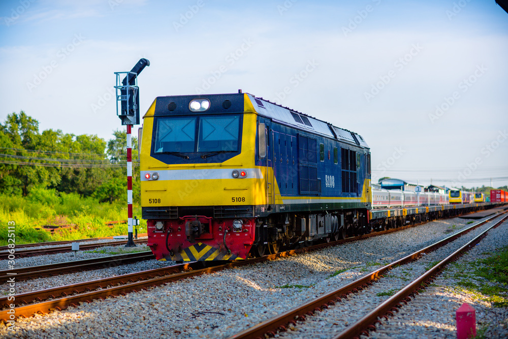 High Speed Electric train. Cargo train platform with freight train ...