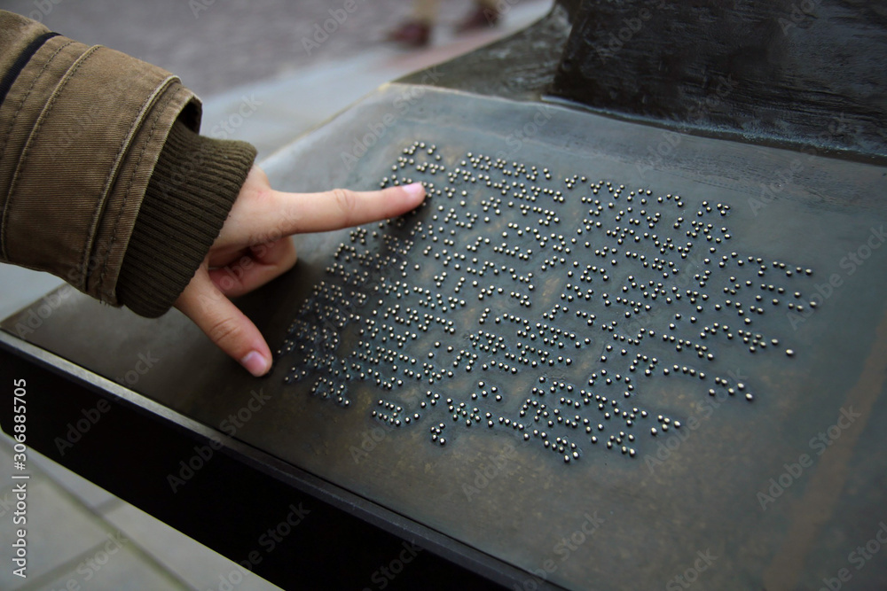 Blind person reading a Braille text. Concept of Braille language. Stock ...
