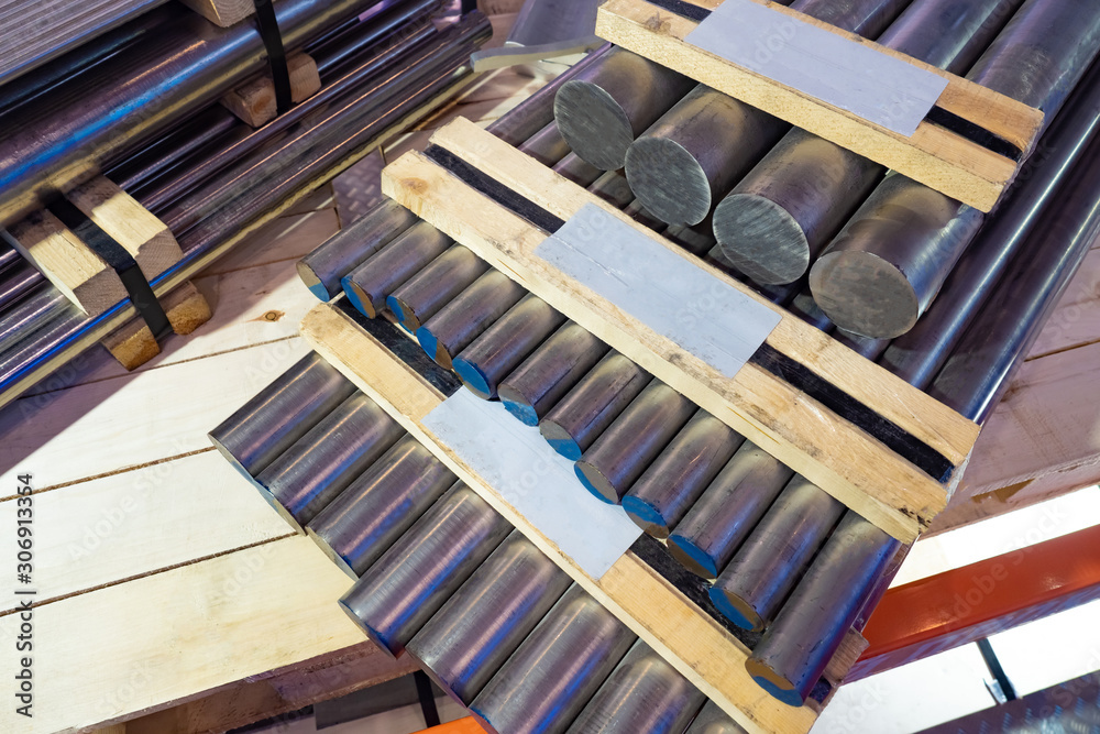 Metalworking. Metal billets of different diameters on pallets. Raw ...