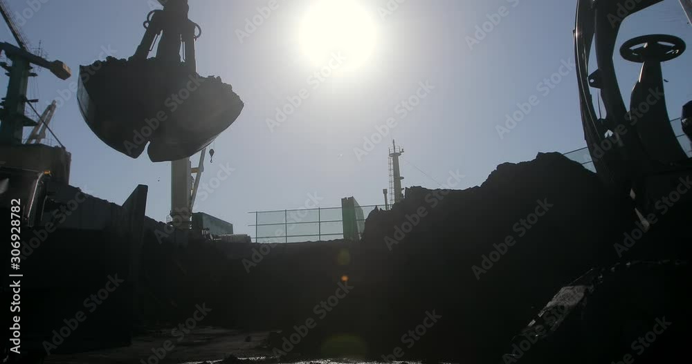 Overall plan. Marine coal terminal. An excavator is loading coal from a ...