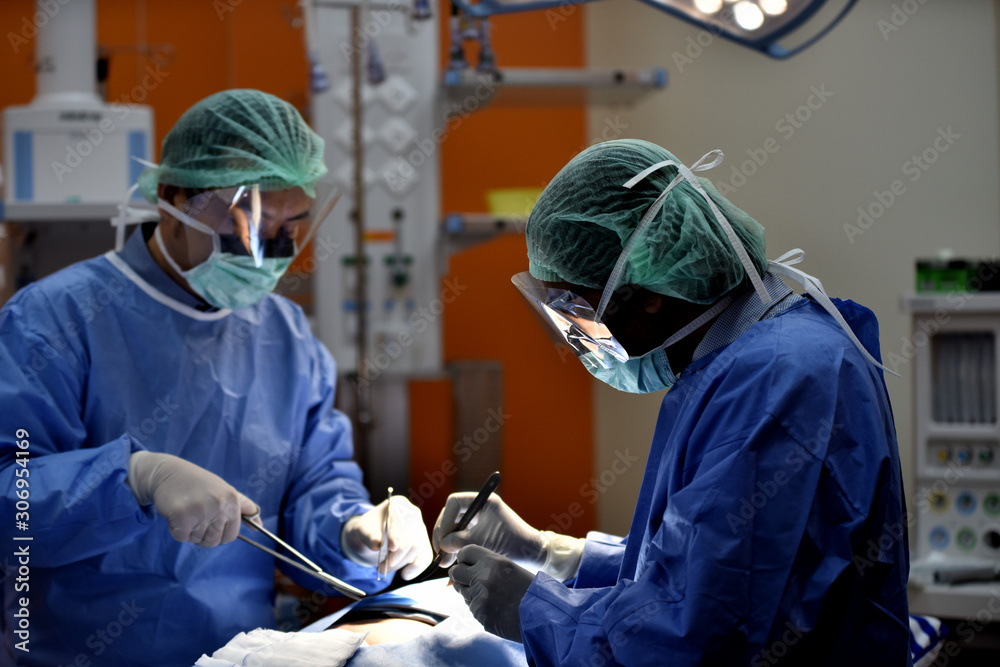 Medical Team Performing Surgical Operation in Modern Operating Room ...