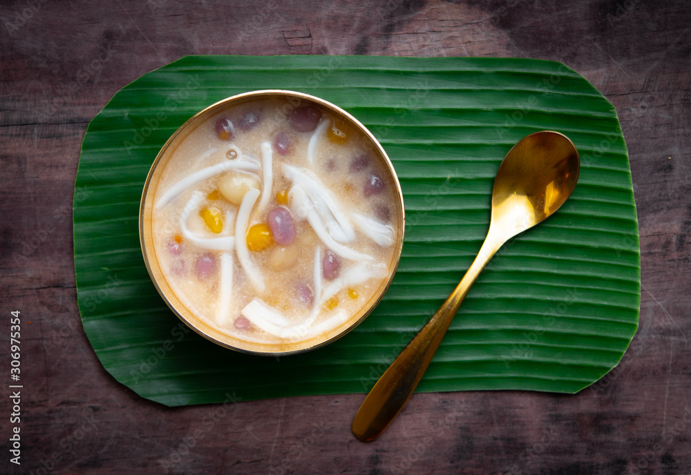 Bua loi,Colorful rainbow Thai glutinous rice balls with coconut milk on ...