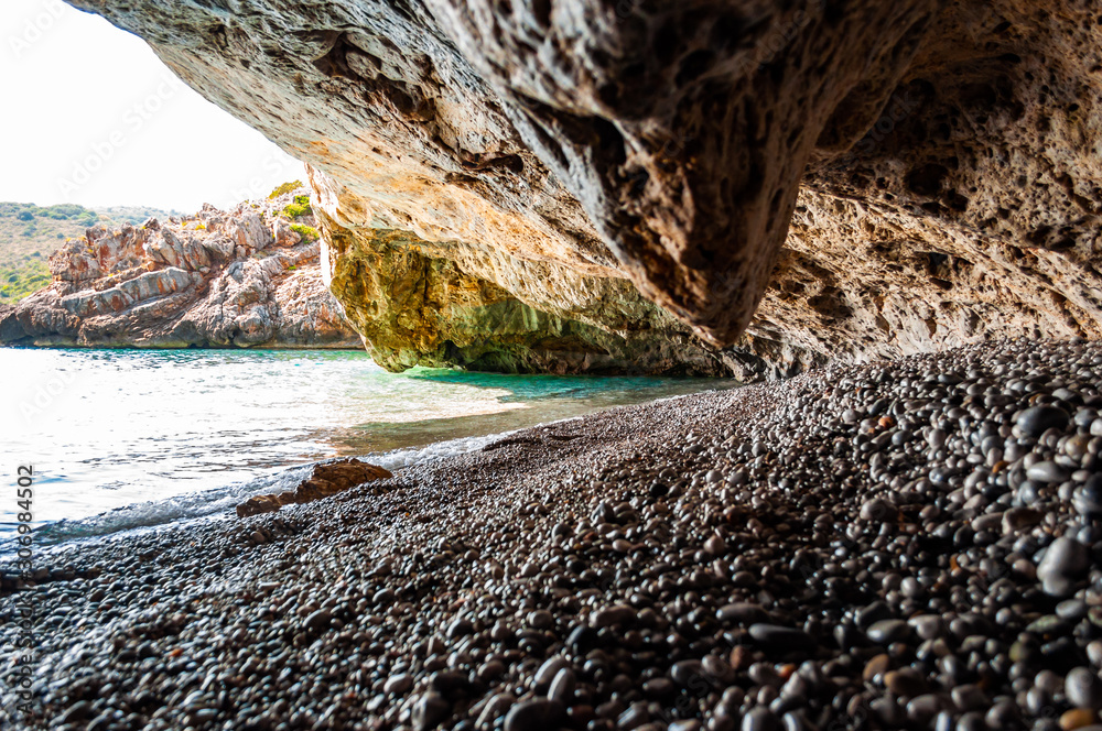 Amazing seascape view from unique sea cave overhanging above water on ...