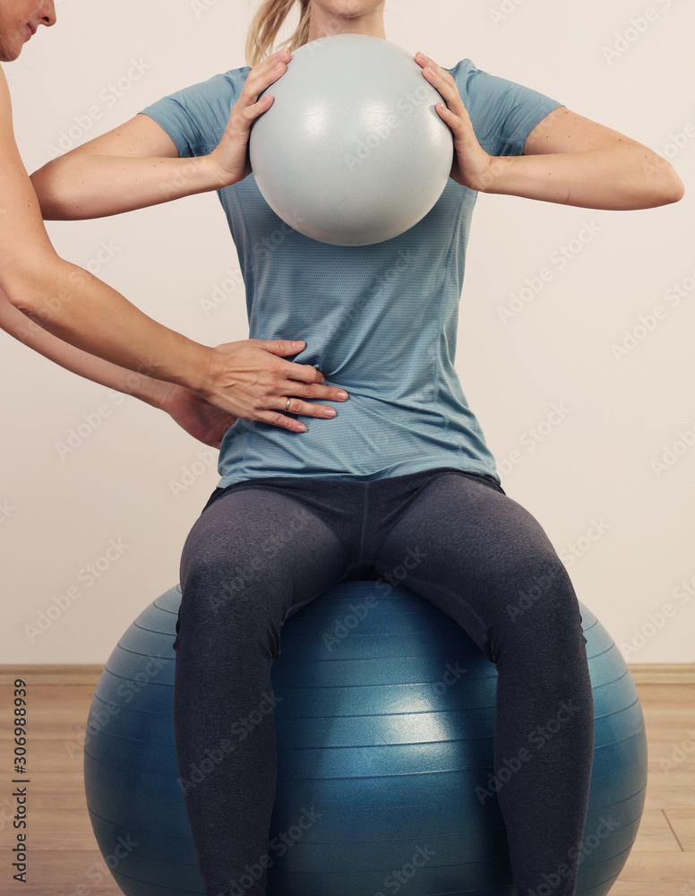 Female Personal Trainer, Pilates class. Corrective gymnastics ...