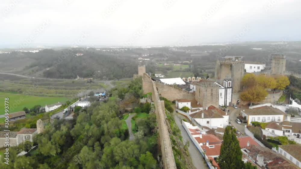 Obidos, castle town in Portugal, old walled city by drone, Aerial 4k ...