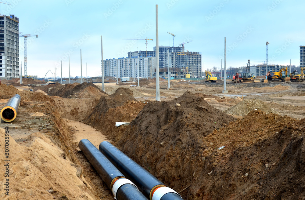 Laying underground storm sewers at a construction site. Groundwater ...