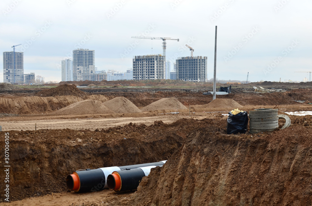 Laying underground storm sewers at a construction site. Groundwater ...
