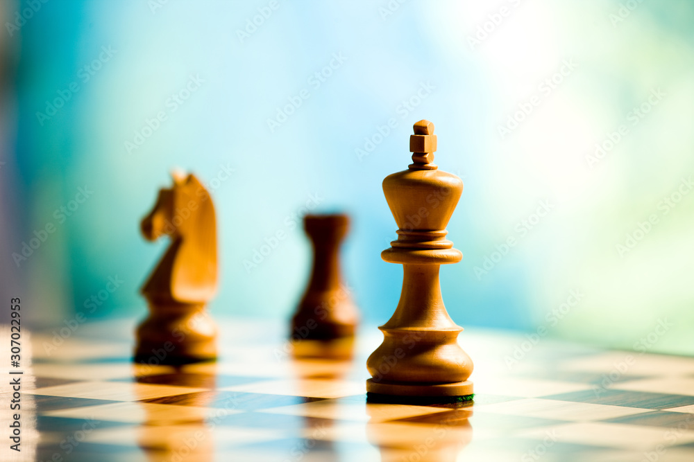 king and other players on a chess board Stock Photo | Adobe Stock